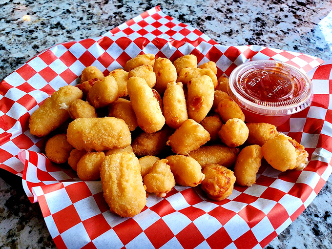 Cheese curds: the unsung heroes of any pub menu. These golden nuggets squeak their way into your heart one delicious bite at a time.