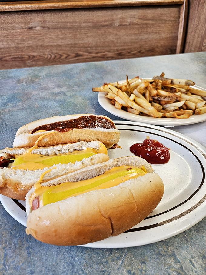 Golden cheese sauce cascading over a steamed frank &ndash; this is what happiness looks like in edible form.