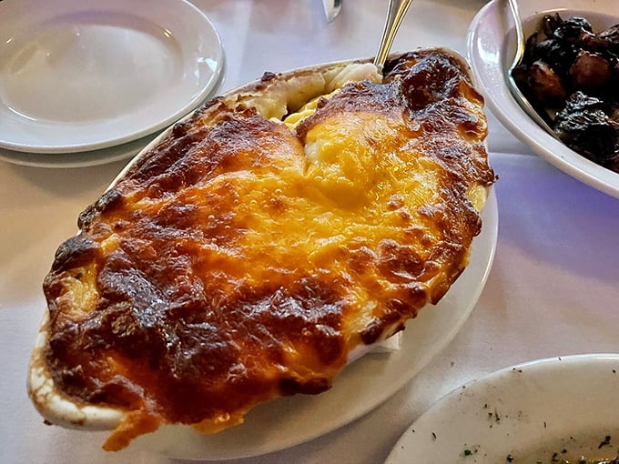 Golden, bubbling cheese transforms ordinary potatoes into something your grandmother would approve of&mdash;if your grandmother had trained at Le Cordon Bleu.