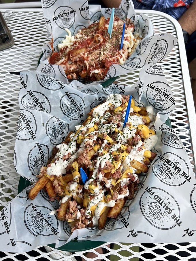 Fries as canvas: This masterpiece of cheese, bacon and ranch transforms the humble potato into something your cardiologist would disapprove of but your soul requires.
