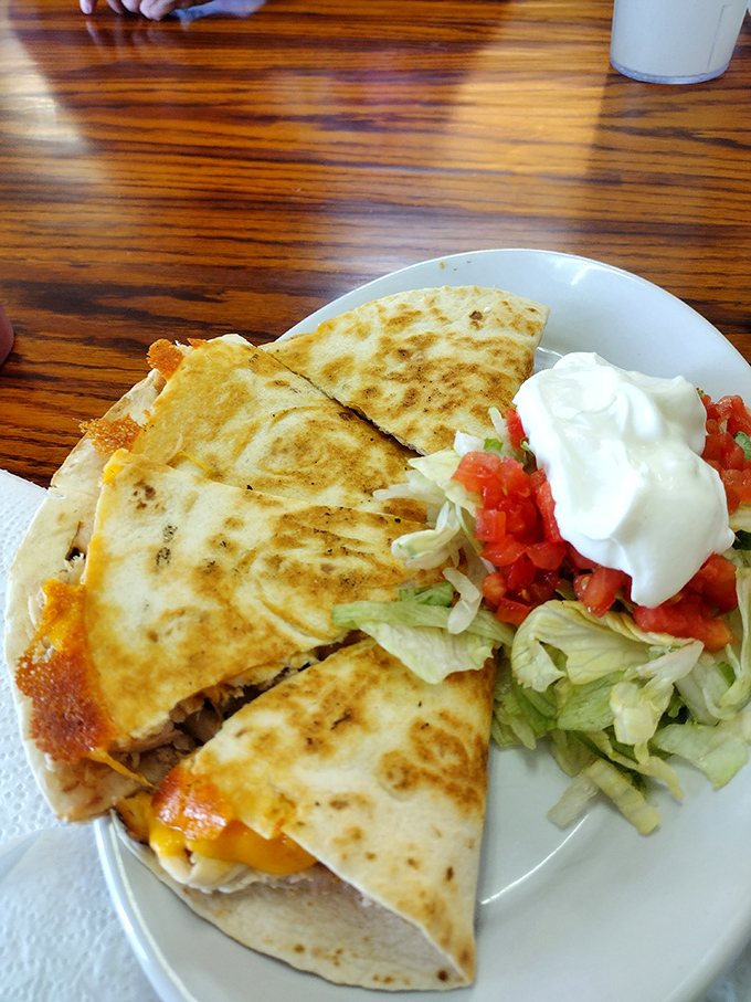 Quesadillas at a BBQ joint? It's culinary rule-breaking that somehow makes perfect sense when the cheese pulls this beautifully.
