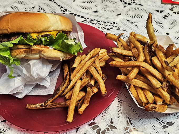 The classic American duo &ndash; a perfectly proportioned cheeseburger alongside those legendary fries. This plate doesn't need white tablecloths to qualify as fine dining.