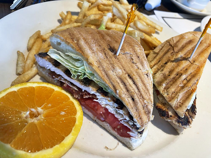 The sandwich that answers the eternal question: "How many delicious layers can you fit between two pieces of grilled bread?" Plenty, it turns out.