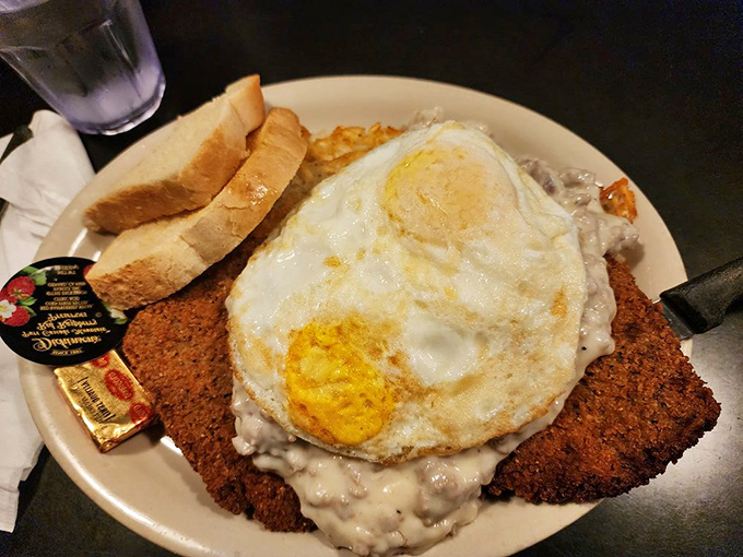 Country-fried steak smothered in gravy with a sunny-side-up egg on top&mdash;the breakfast of champions or the dinner of dreams? Why choose?