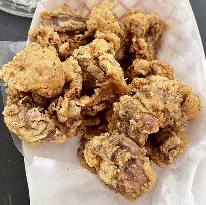 Gizzards: the secret handshake of Miller's regulars. If you know, you know—and if you don't, it's time to join the club.