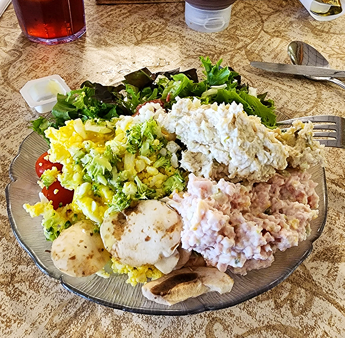A salad plate that defies the sad desk lunch of your workweek – colorful, homemade goodness arranged like an edible color wheel of Amish tradition.