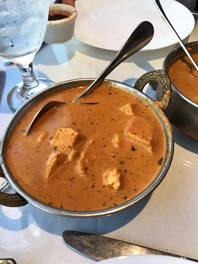 Chunks of tender chicken swimming in a sunset-colored sauce. If comfort food had a PhD, it would be butter chicken.