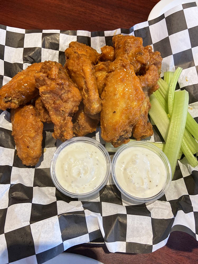 Wings that don't need a sporting event as an excuse to be devoured, served with dipping sauces worth fighting over.