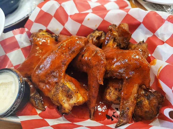Wings that make you question everything you thought you knew about buffalo sauce. These glossy, flame-kissed beauties deliver heat with purpose.