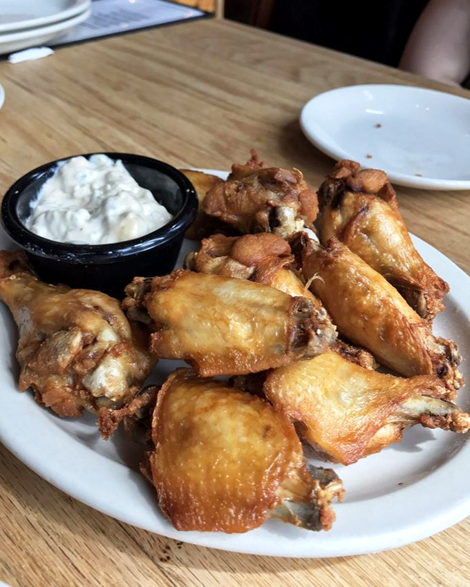 Golden-fried chicken wings that crackle with each bite &ndash; the kind that make you wonder why you ever bothered with napkins in the first place.