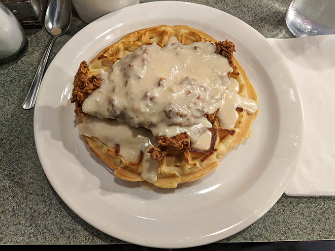 Chicken and waffles &ndash; the breakfast-meets-lunch romance that proves opposites attract. That sausage gravy blanket takes this relationship to the next level.