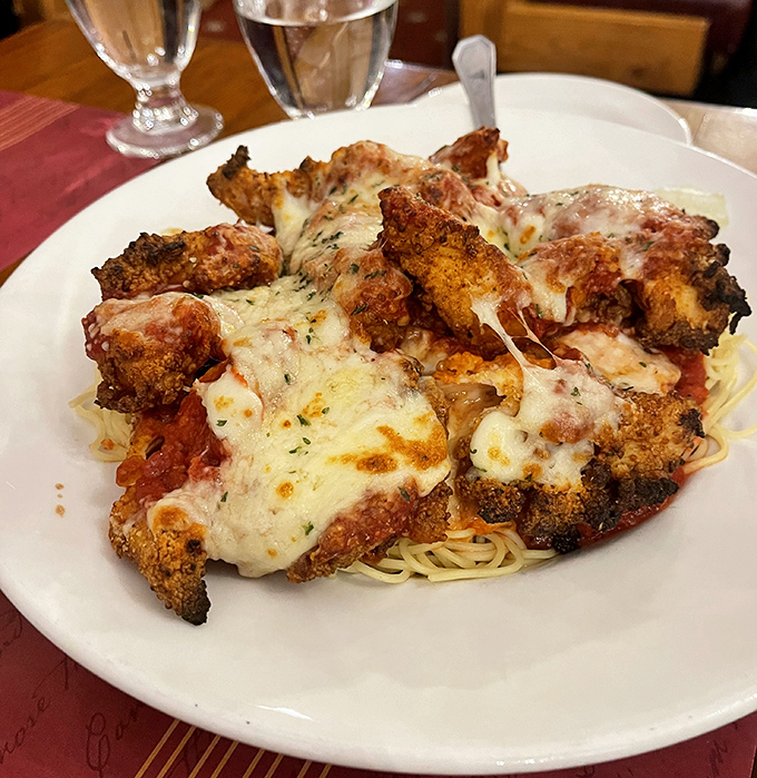 Chicken parmesan that would make an Italian grandmother nod in approval. That cheese pull deserves its own Instagram account.