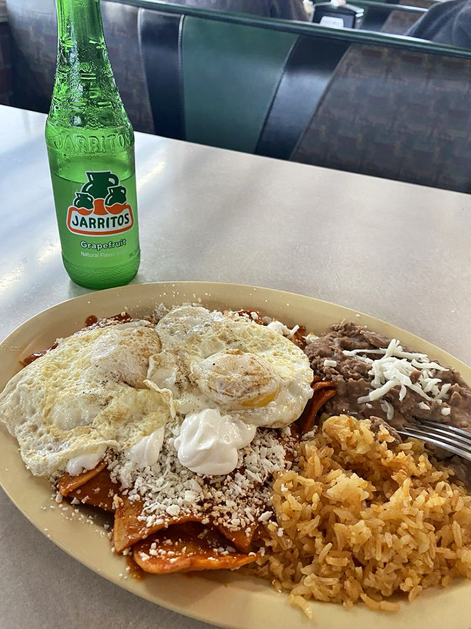 Breakfast of champions! These chilaquiles topped with perfectly fried eggs would make hitting the snooze button a criminal offense.