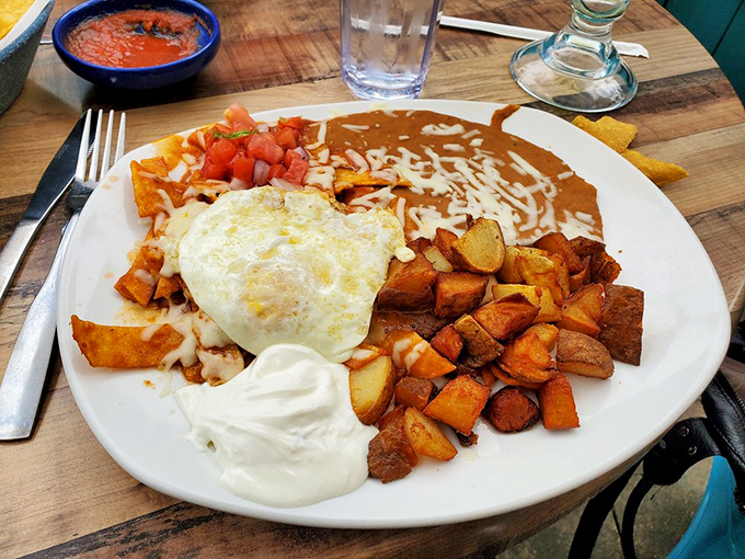 Breakfast of champions! This chilaquiles plate with its sunny-side-up egg is like Mexico's delicious answer to "What happens to tortilla chips overnight?"
