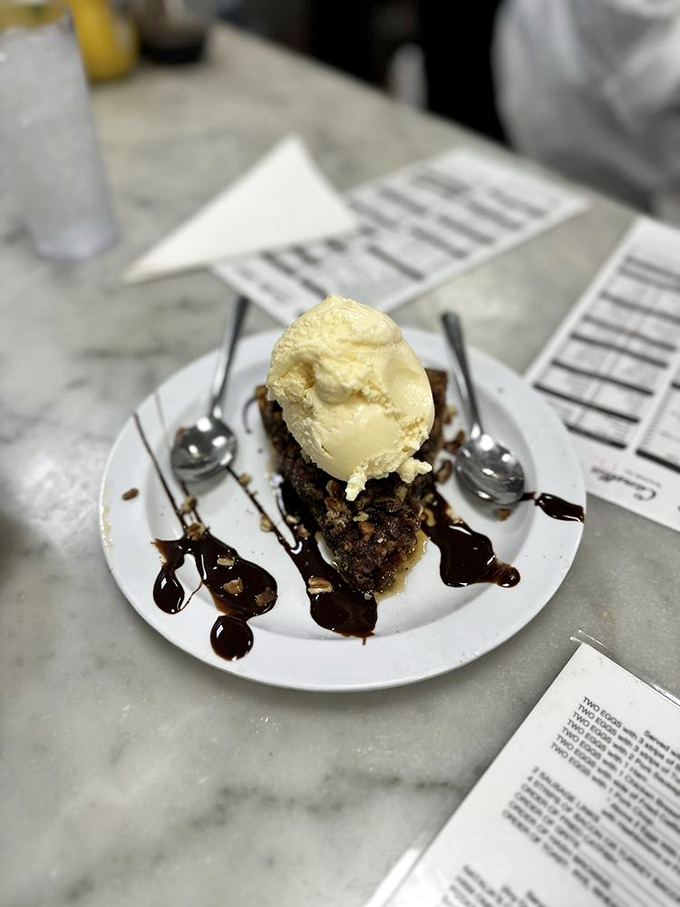 Pecan pie that makes grown adults weep with joy&mdash;the melting ice cream creating a sweet river delta on the plate.