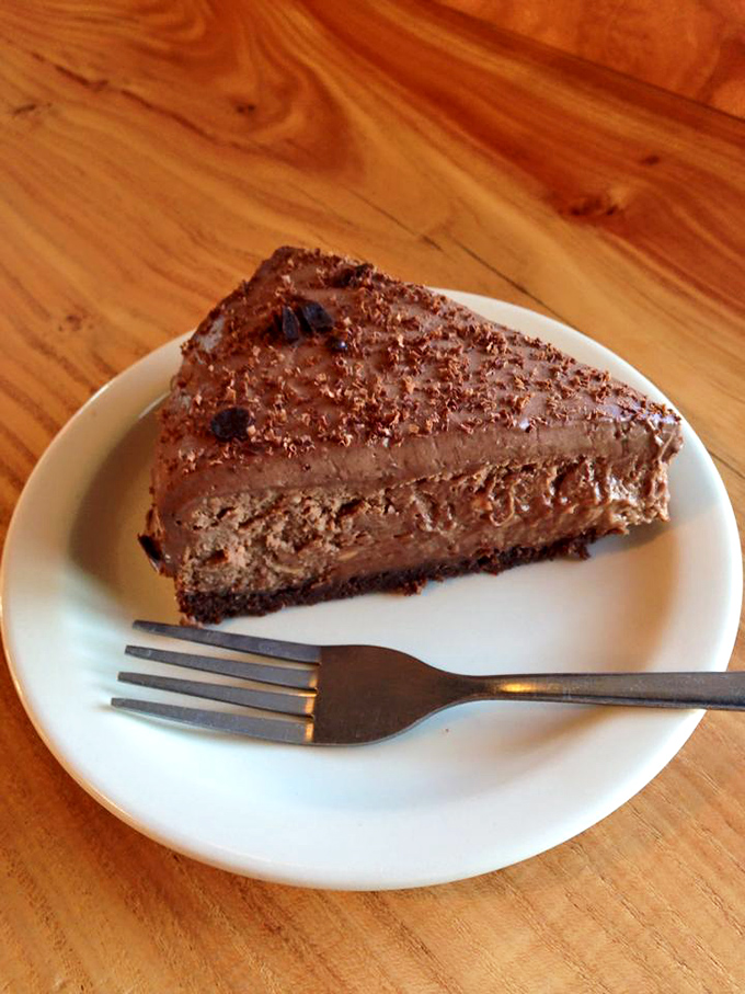 Chocolate cheesecake so decadent it should require a permission slip. The fork is merely a formality between you and bliss.
