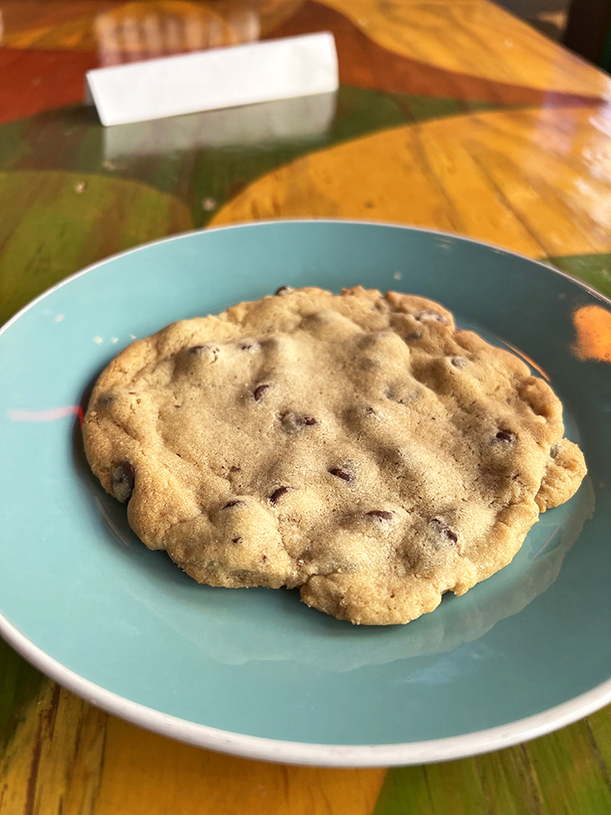 Chocolate chip cookies the size of small planets &ndash; crisp edges, chewy centers, and enough chocolate to make you temporarily forget about the pizza.