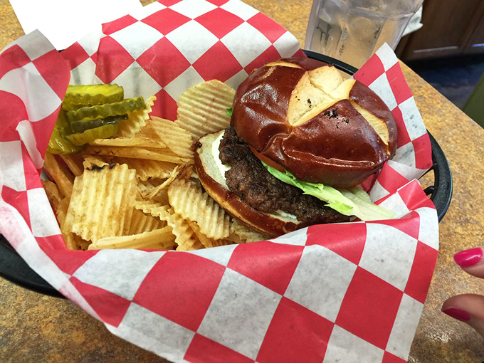 Burger perfection on a pretzel bun. This hand-formed patty with fresh toppings proves why The Chuckwagon boldly claims to have the "Best Hamburgers."
