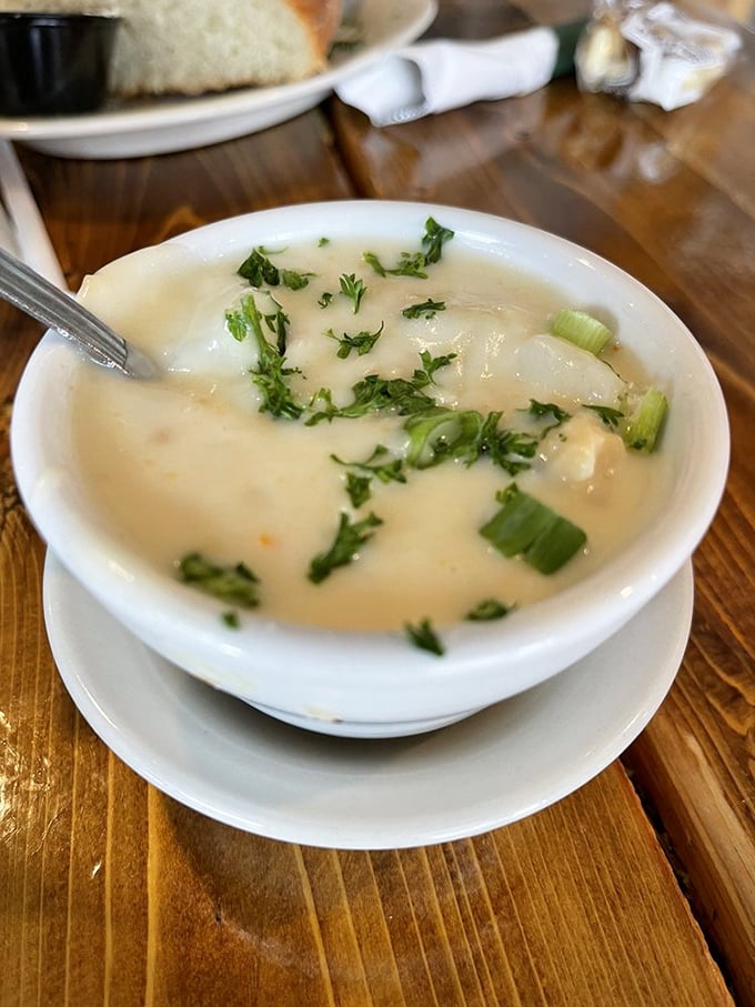 This isn't just chowder; it's a creamy hug in a bowl, dotted with tender seafood and fresh herbs.