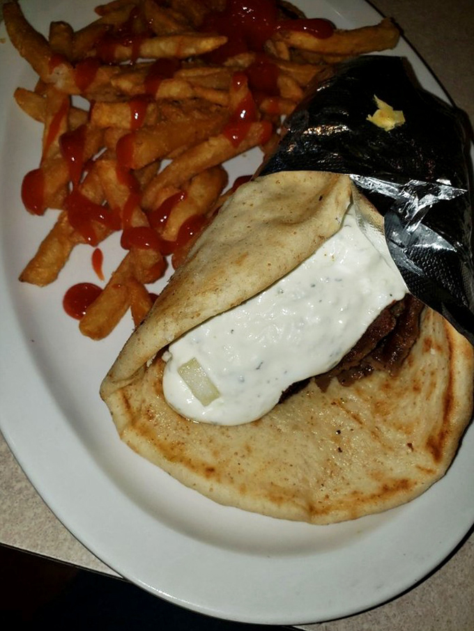 This gyro isn't just wrapped&mdash;it's embraced in warm pita with a sauce so good you'll be plotting your return before the last bite.