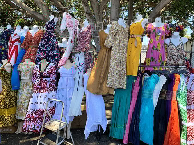 A rainbow of sundresses sways gently in the breeze, each one holding the promise of summer adventures yet to come.