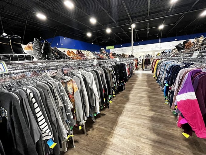 Clothing racks stretch toward the horizon like a fashionista's dream. The thrill of the hunt is real when designer labels lurk among everyday finds.