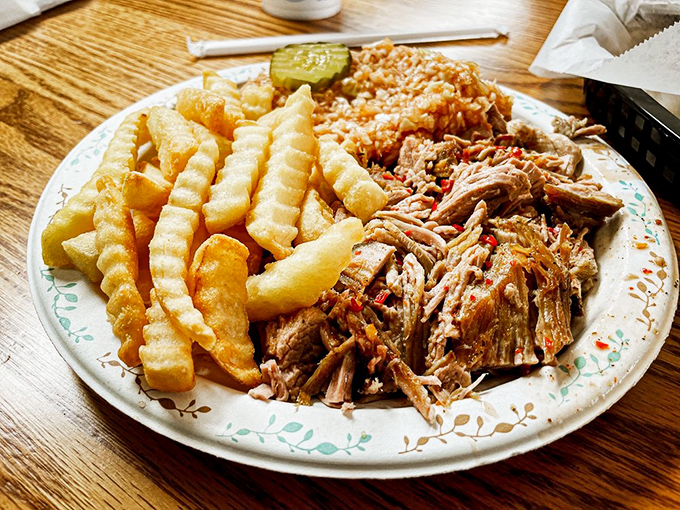 Chopped barbecue with that perfect balance of smoke, tang, and tenderness. This plate is why people drive across state lines.