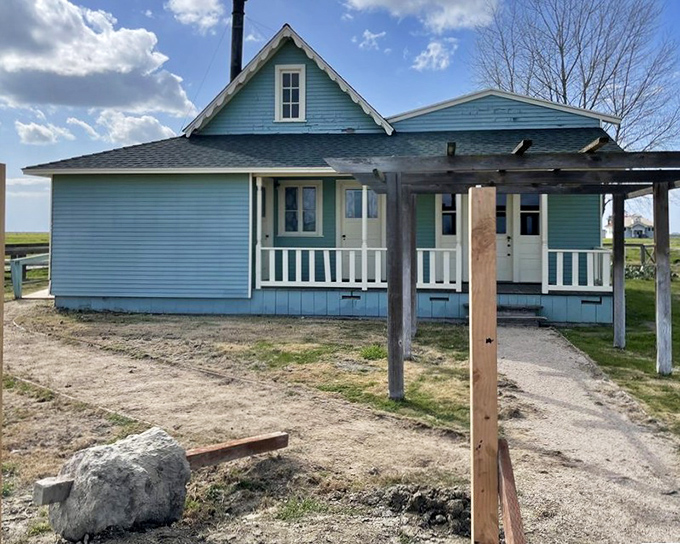 This blue-hued home represents the American dream in its purest form&mdash;built by a man who journeyed from slavery to founding a town.