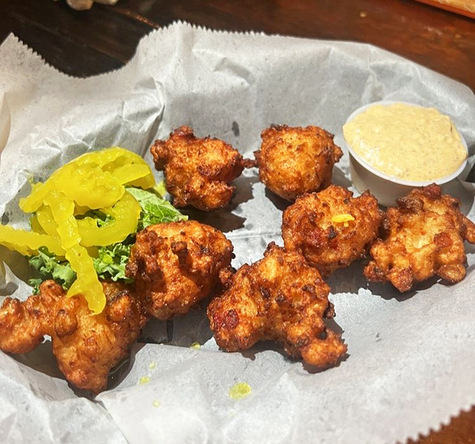 Conch fritters that would make Jimmy Buffett write another verse&mdash;crispy, golden nuggets of the sea served with banana peppers and a dipping sauce worth bottling.