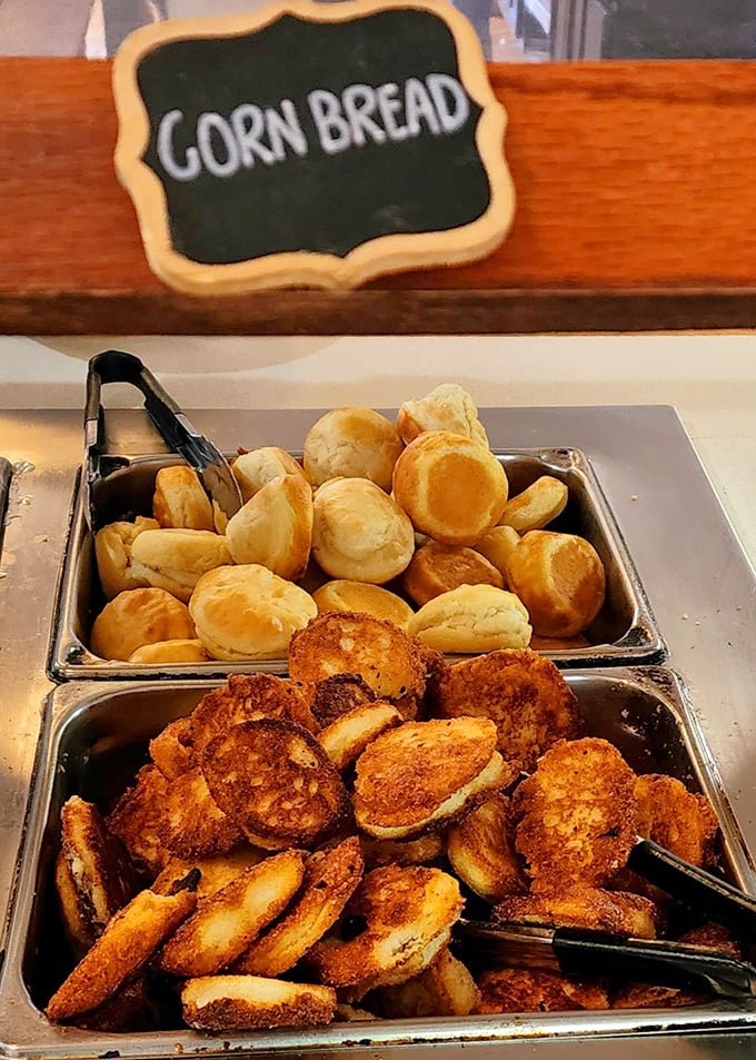 Golden cornbread muffins nestled beside their crispy-edged cousins&mdash;the kind of bread basket that makes you reconsider your carb-cutting promises before the main course arrives.