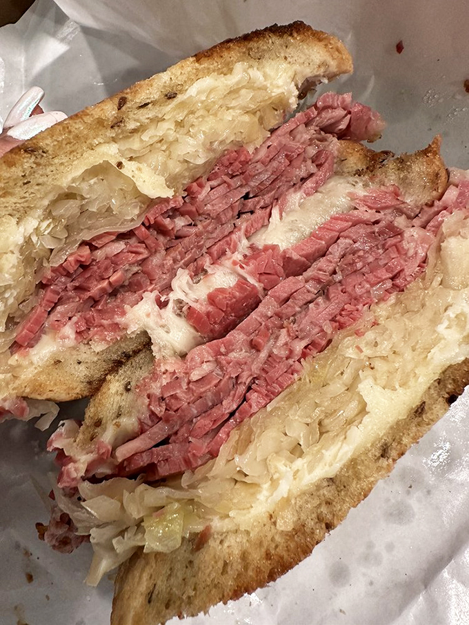 Not just a sandwich, but a religious experience. The cross-section reveals the careful construction&mdash;each ingredient playing its essential role in this symphony of flavors.