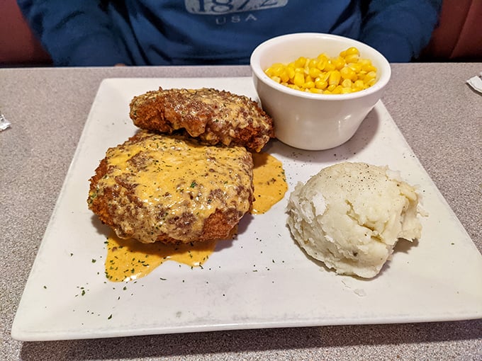 These aren't just crab cakes; they're edible gold medals, perfectly seasoned and served with sides that know their supporting role.