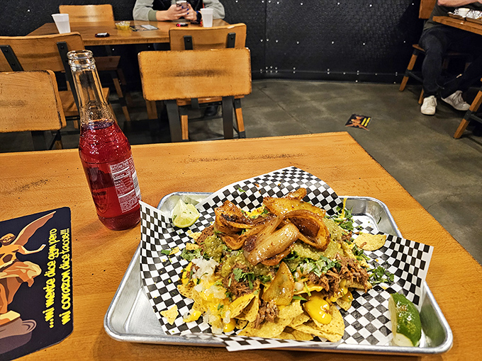 Behold: the nacho mountain that dreams are made of. Those caramelized onions on top aren't just ingredients&mdash;they're little flavor bombs of joy.