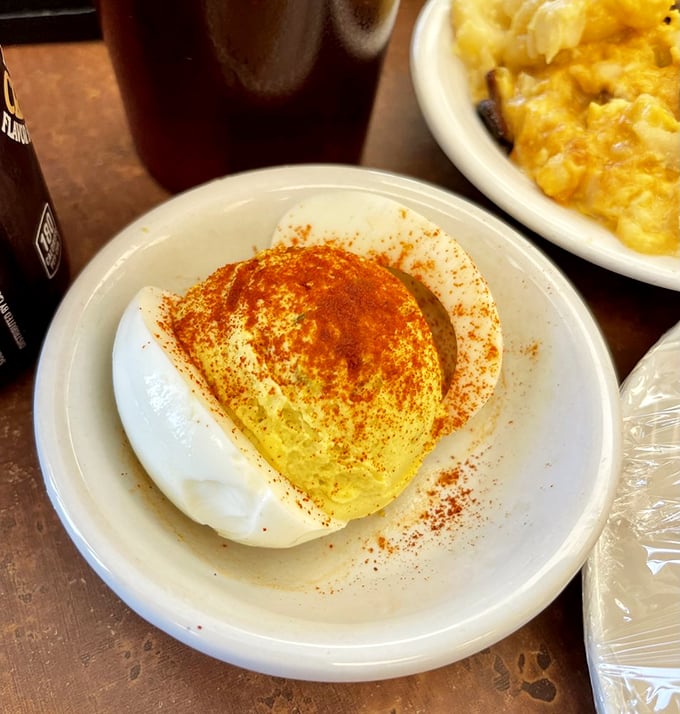 This isn't your aunt's potluck deviled egg; it's a perfectly balanced morsel of creamy, tangy goodness that deserves its own spotlight.