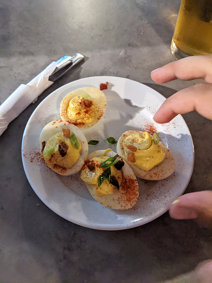 These aren't your grandmother's deviled eggs&mdash;unless she was secretly a culinary genius. Topped with bacon bits and fresh herbs, they're deliciously rebellious.