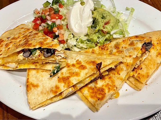 This quesadilla doesn't just stack&mdash;it towers with flavor. Melty cheese, perfectly grilled tortillas, and fillings that make sharing an act of true generosity.