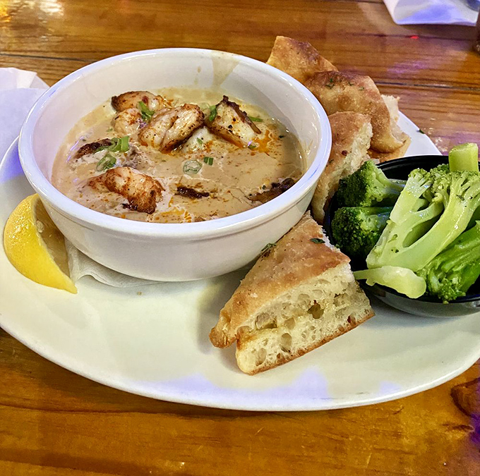 This creamy bowl of Drunken Shrimp is what comfort food dreams are made of&mdash;swimming in sauce with bread standing by for rescue missions.