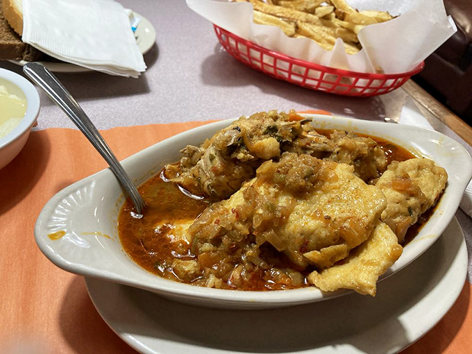 Swimming in a tomato bath that would make any dumpling feel pampered, this chicken paprikash is comfort food's answer to a warm hug.