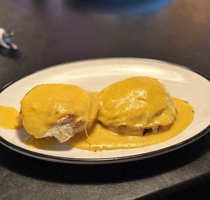 These Eggs Benedict aren't just breakfast, they're a sunrise celebration with hollandaise sauce that would make a French chef nod in approval.