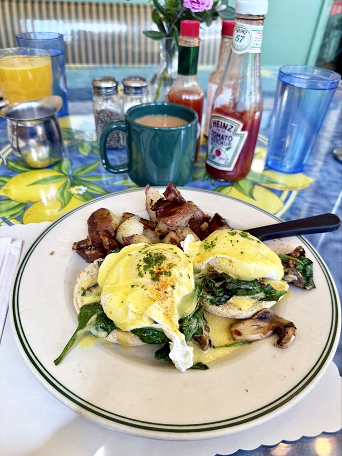 The holy trinity of breakfast: spinach, mushrooms, and hollandaise. This Benedict doesn't just break eggs—it breaks the monotony of ordinary mornings.