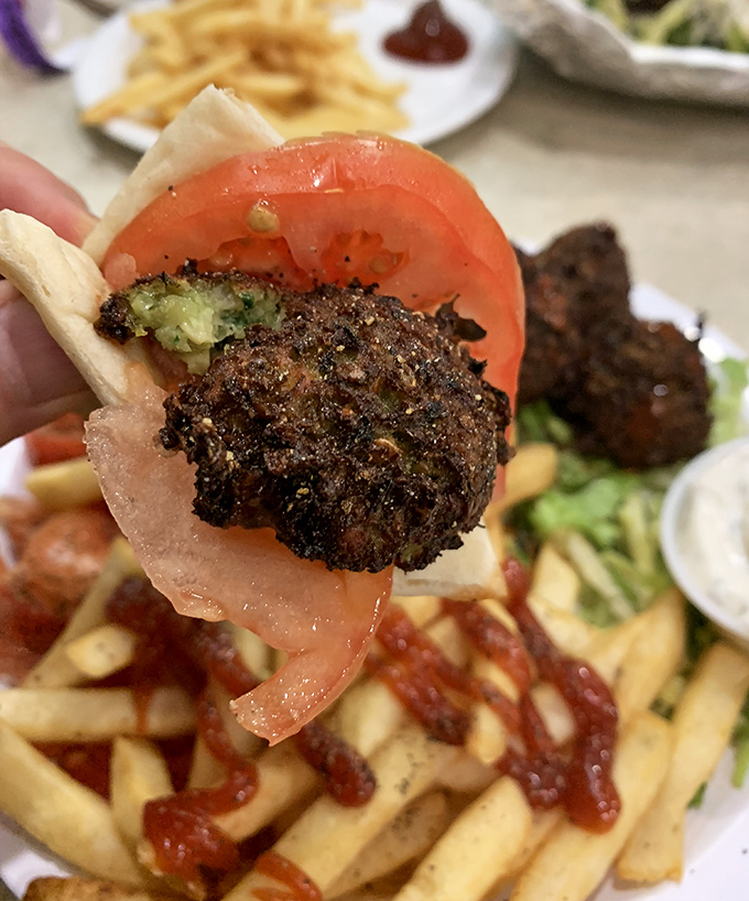 That moment when pita meets falafel is like a beautiful cross-cultural handshake that your taste buds get to witness.