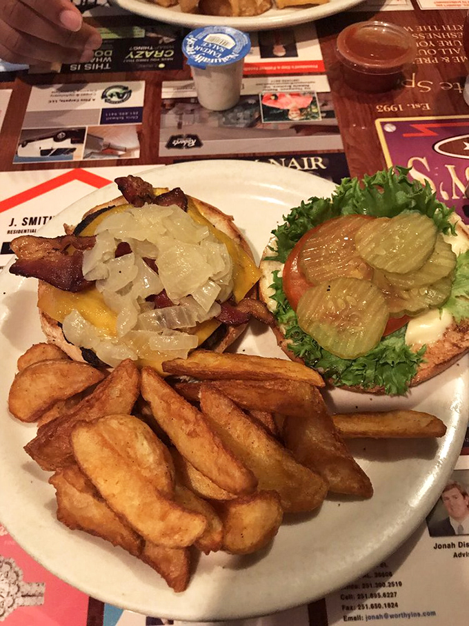 Behold the architecture of happiness&mdash;layers of beef, bacon, and cheese creating a skyscraper of flavor that would make Frank Lloyd Wright jealous.