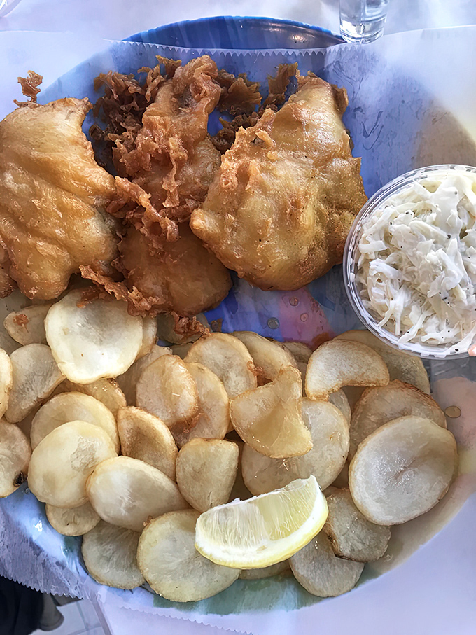 This isn't just fish and chips&mdash;it's an edible postcard from the coast. Flaky white fish in a golden jacket, surrounded by chips that crunch like autumn leaves.