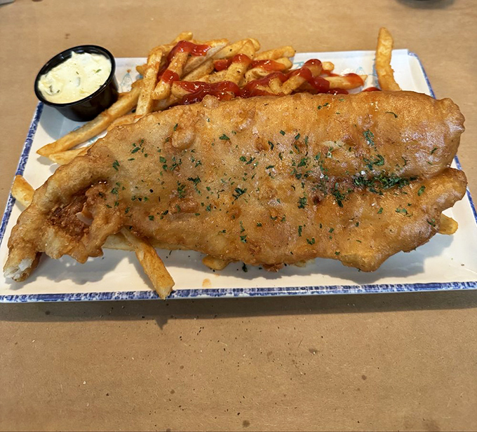 Fish and chips that would make a British pub jealous. That golden batter is the evening gown your fish always dreamed of wearing.