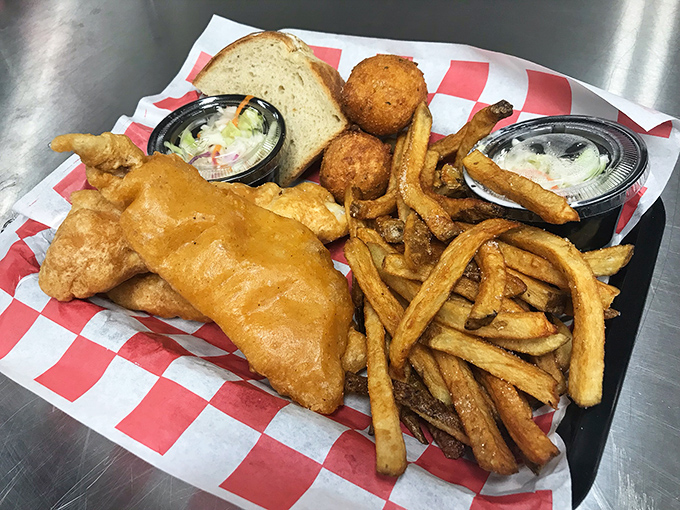 Fish so perfectly fried it would make a New Englander weep with joy, paired with those legendary fries. The coleslaw's just there for moral support.