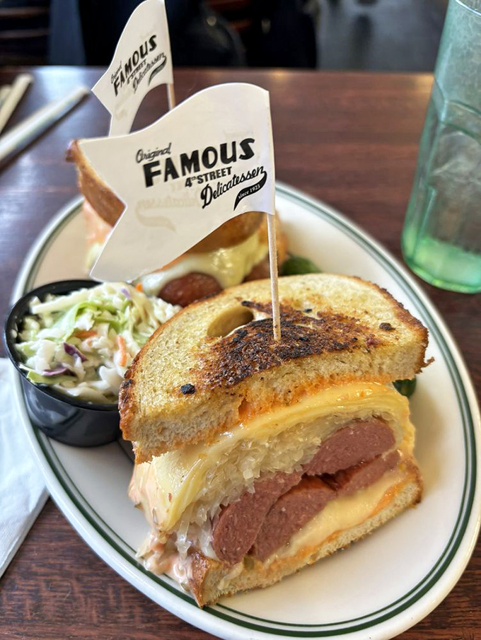 The Reuben reimagined&mdash;where sauerkraut, melted cheese, and perfectly grilled bread create a symphony that would make even Mozart put down his fork in awe.