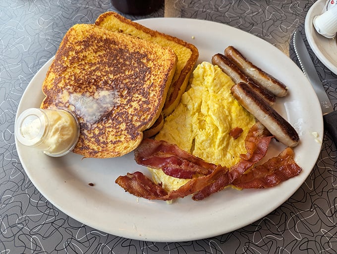 French toast so perfectly golden it deserves its own Instagram account. Paired with bacon that's achieved that mythical balance between crispy and chewy.