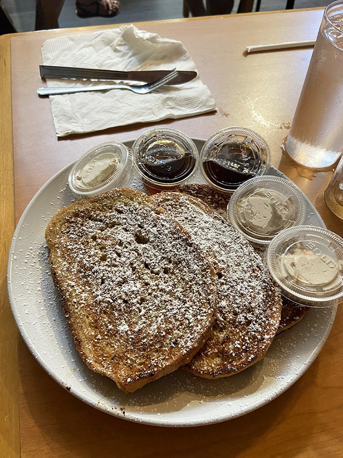 Heart-shaped French toast dusted with powdered sugar and surrounded by tiny cups of sweet possibilities&mdash;breakfast's answer to a candy store.