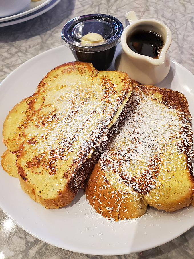 French toast that's dressed for success &ndash; powdered sugar dusting that's like fresh snow on a golden-brown landscape of deliciousness.