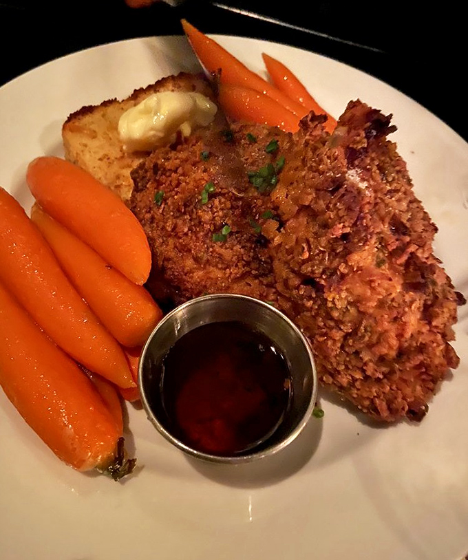 Fried chicken with a side of perfectly glazed carrots. It's the dinner your grandmother would make if she secretly attended culinary school at night.